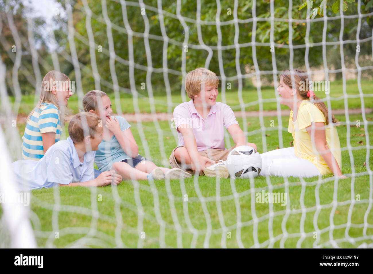 Full length smiling football hi-res stock photography and images - Alamy
