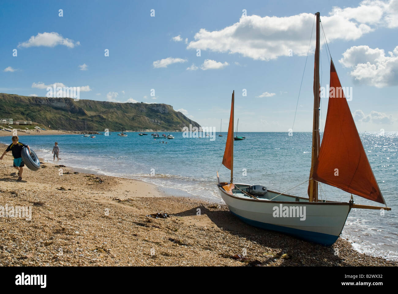 A boat on Ringstead Beach in Dorset Stock Photo - Alamy