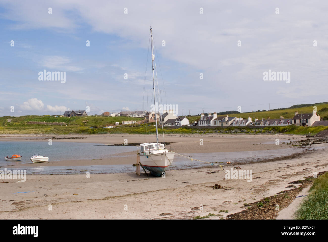 A Yacht and Small Boats Beached in the Natural Harbour at Port Logan ...