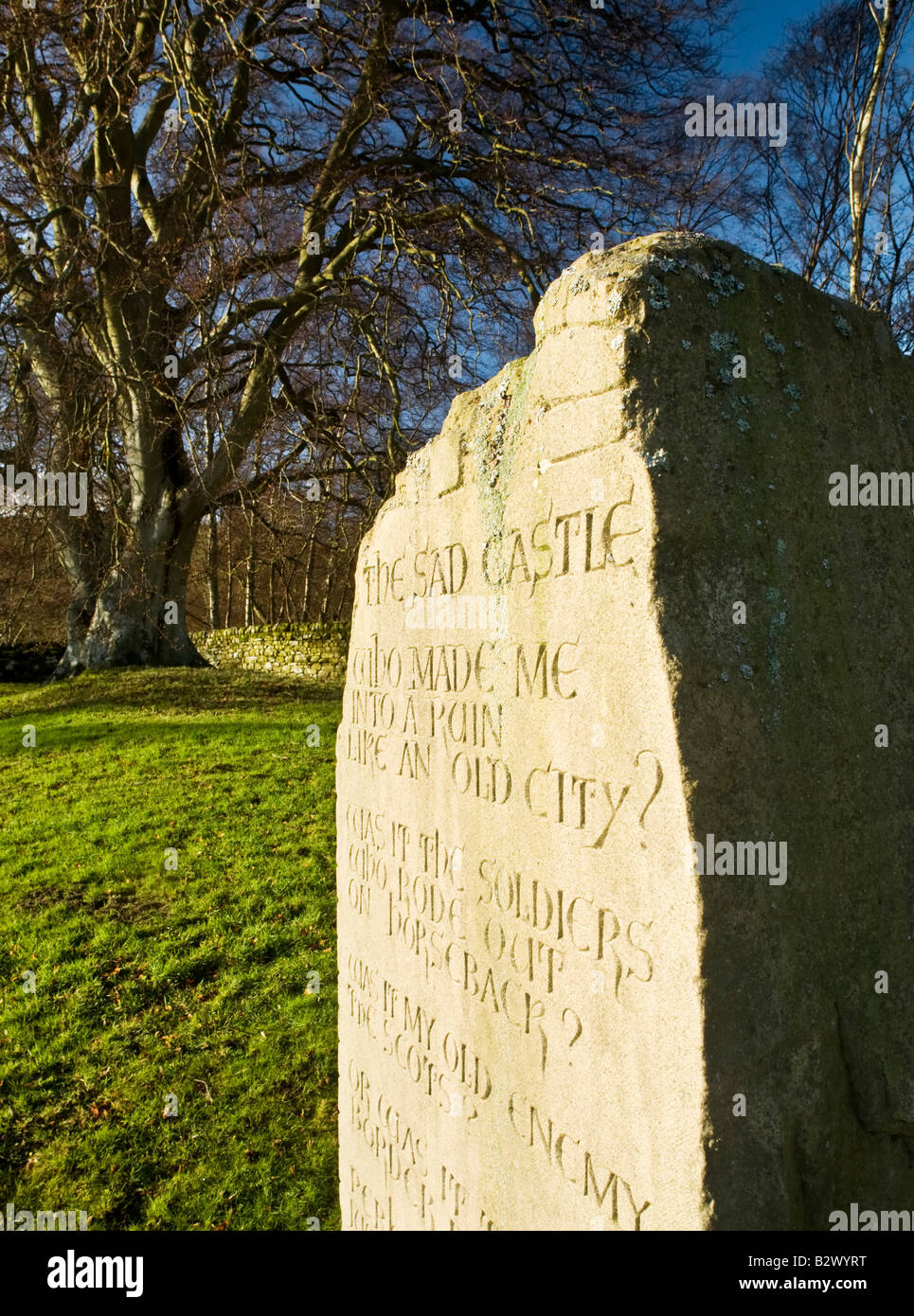 Stone displaying a poem about Harbottle Castle near the entrance to the ...