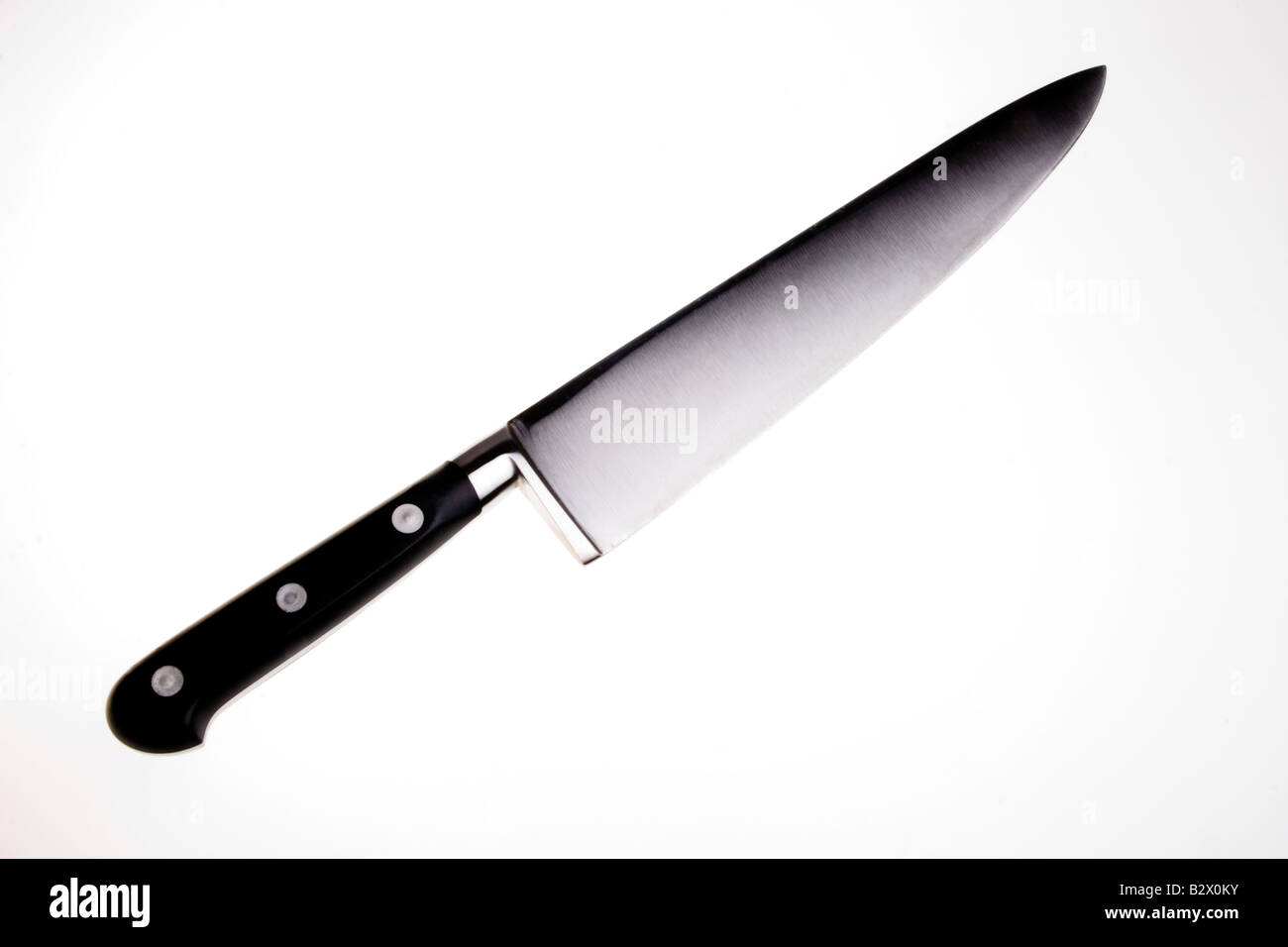 A stainless steel kitchen knife with a 9 inch or 229 millimetre blade ...