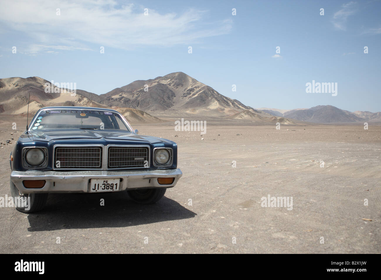 Dodge car in a desert Stock Photo - Alamy