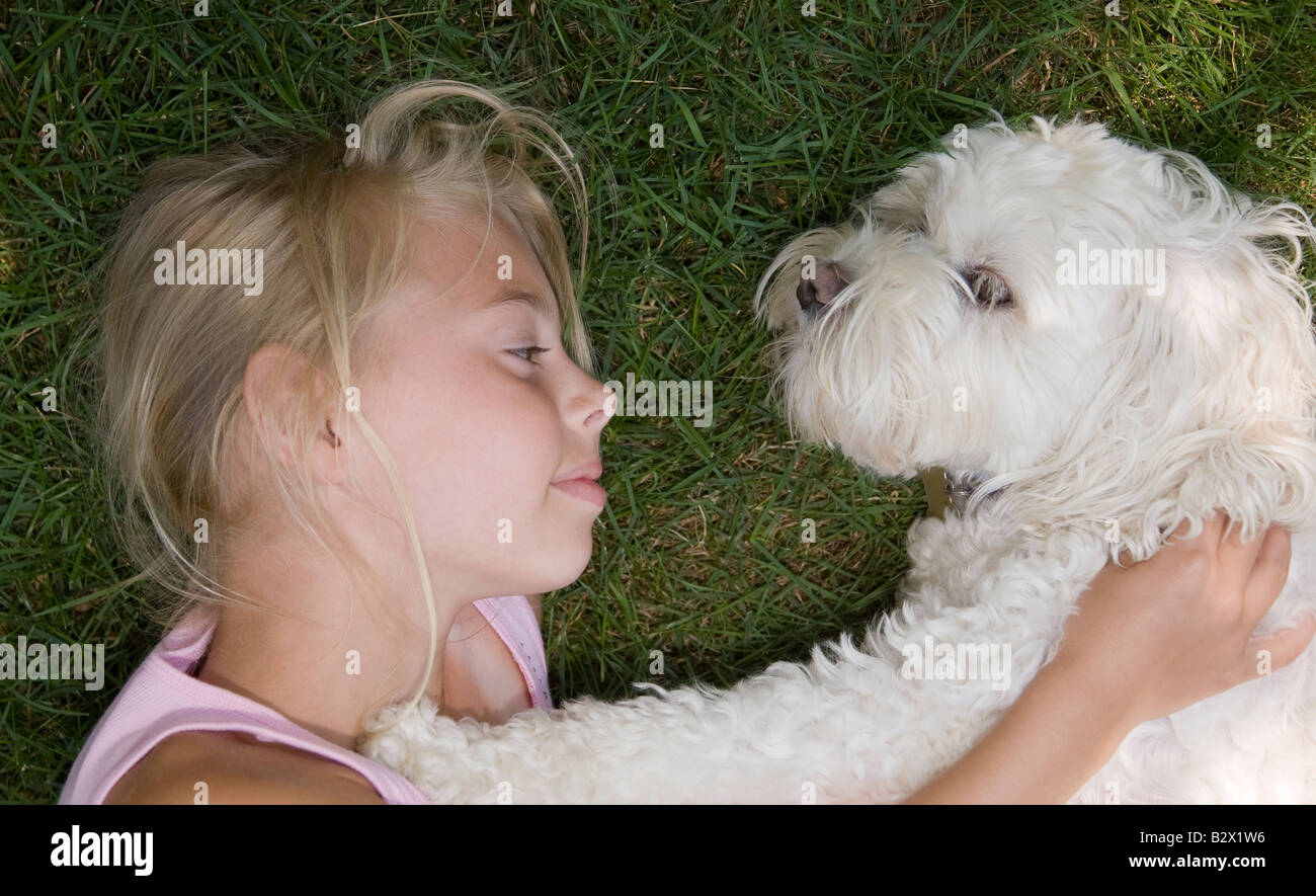 Young girl and her pet dog Stock Photo - Alamy