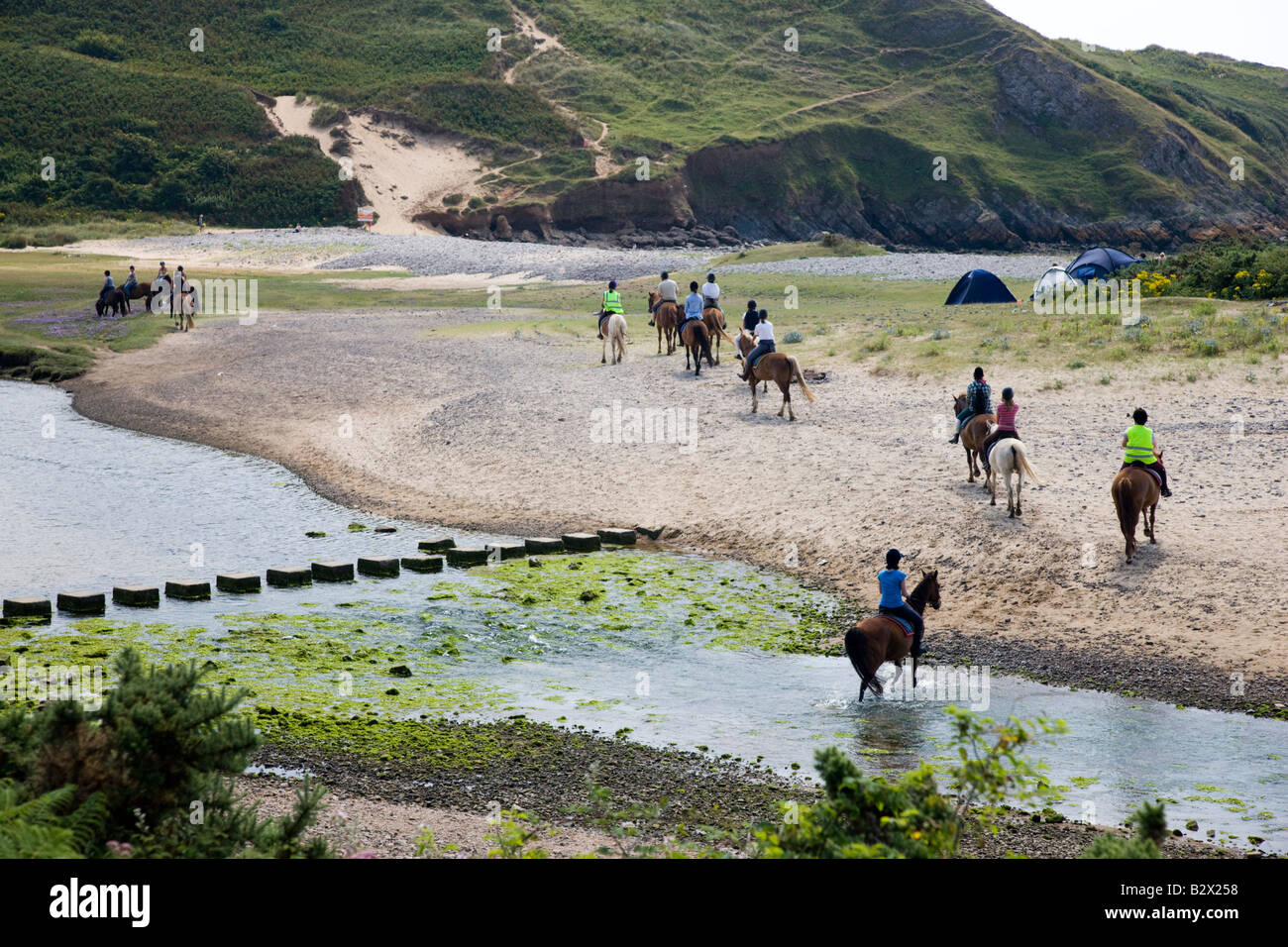 Pony Trekking across Pennard Burrows in Threecliffs Bay Gower Stock ...