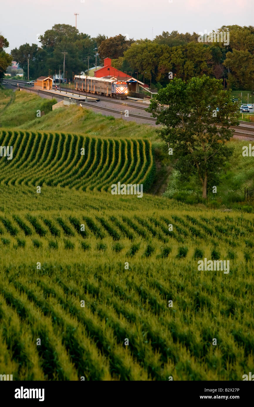A commuter train makes a stop at a rural suburban station on Chicago's ...