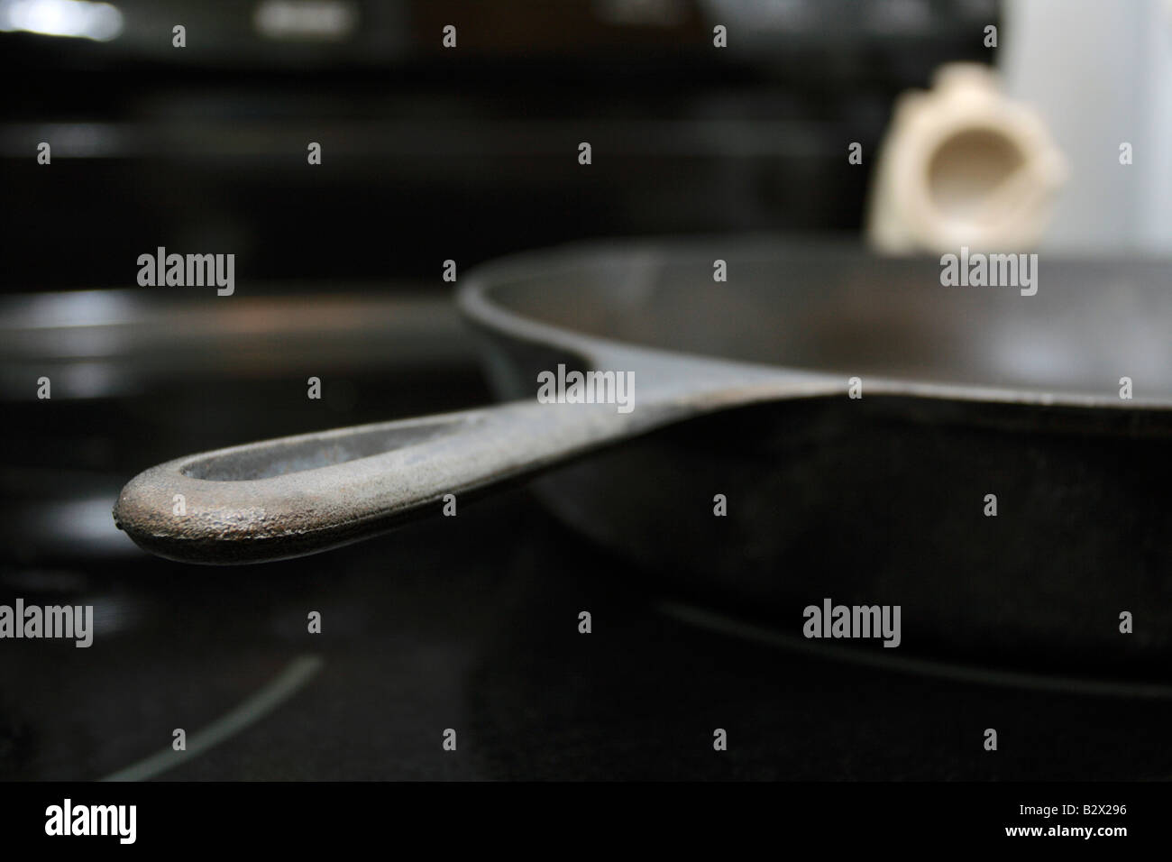 Iron skillet handle Stock Photo - Alamy