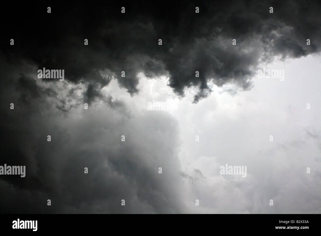 Squall line thunderstorm clouds at the edge of a rotating opening Stock ...