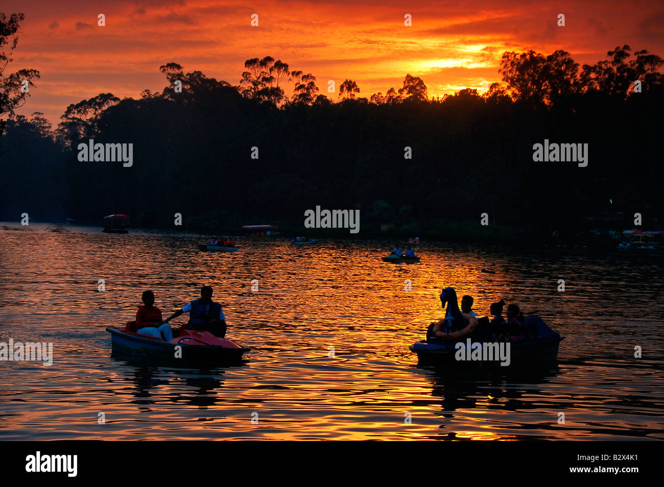 Boating at Ooty lake at sunset Stock Photo - Alamy