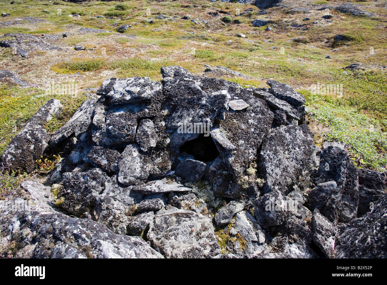 a stone chambered cairn in Ilulissat in Greenland These ancient graves ...