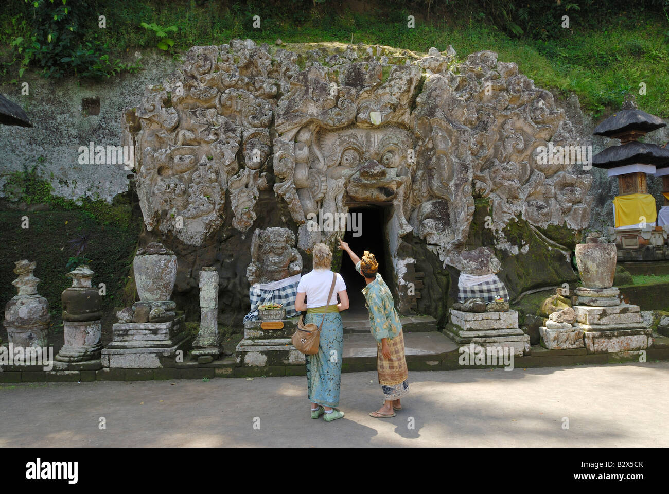 ELEPHANT CAVE, Goa Gajah, tourists in front, Bali, Indonesia, Asia ...