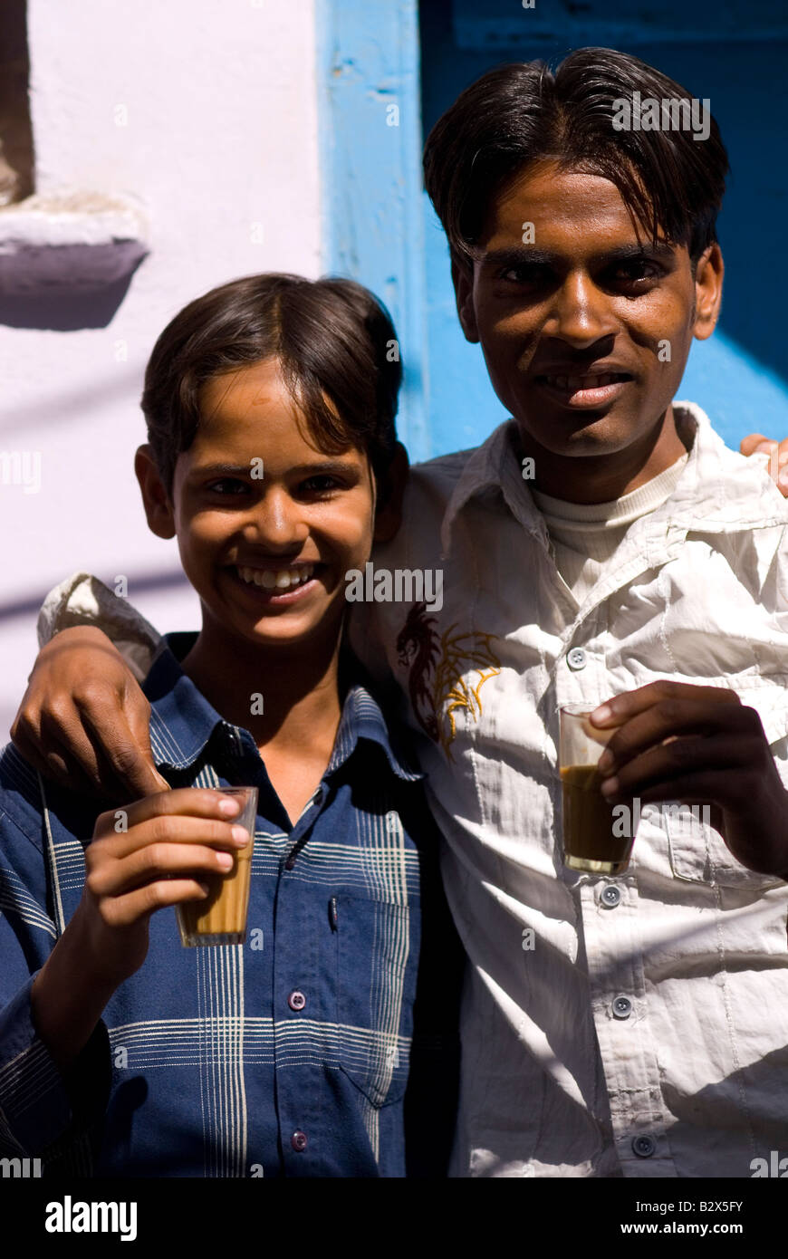 Boy and Man drinking Chai, Udaipur, Rajasthan, India, Subcontinent ...