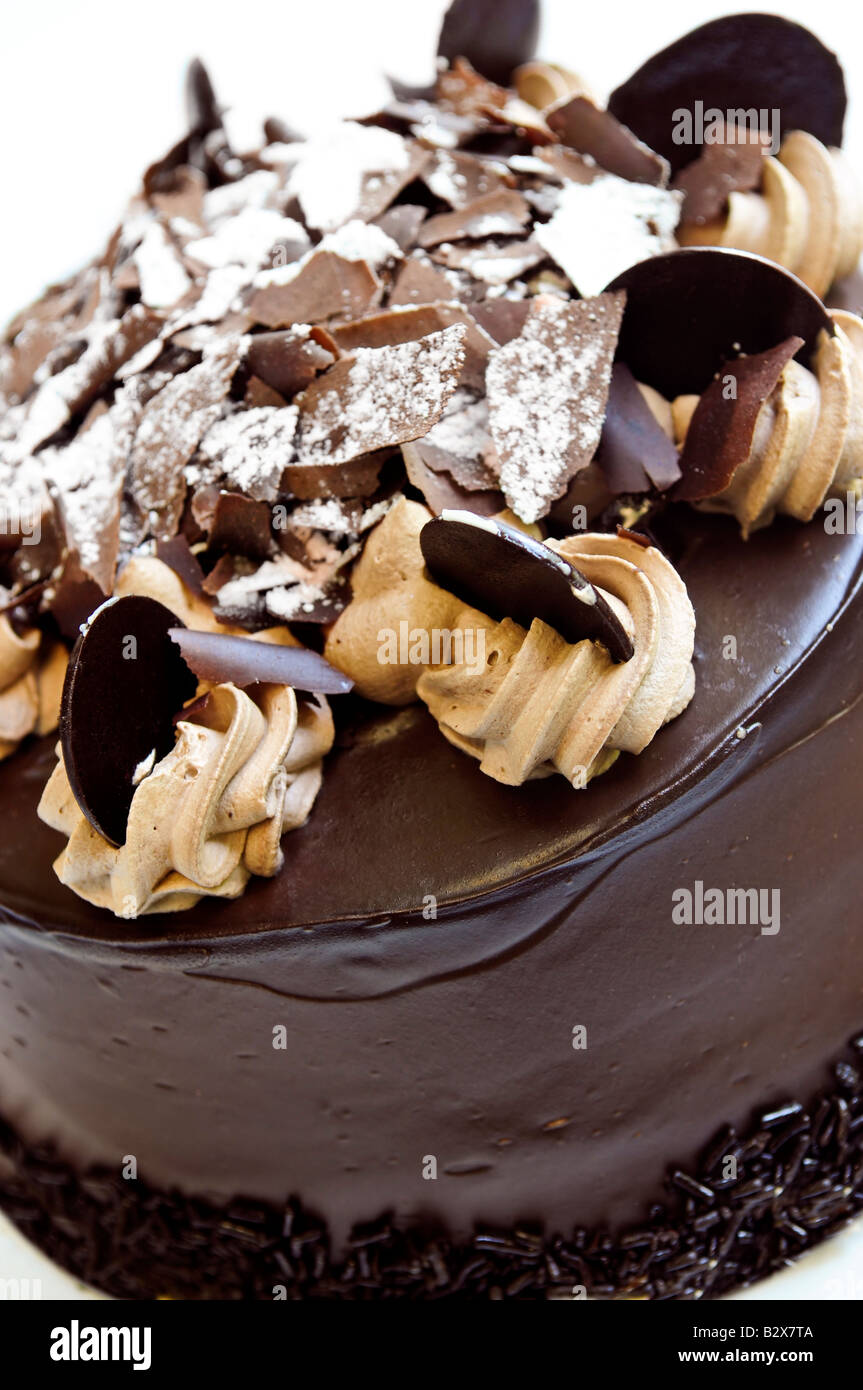 Round chocolate cake with frosting close up Stock Photo - Alamy