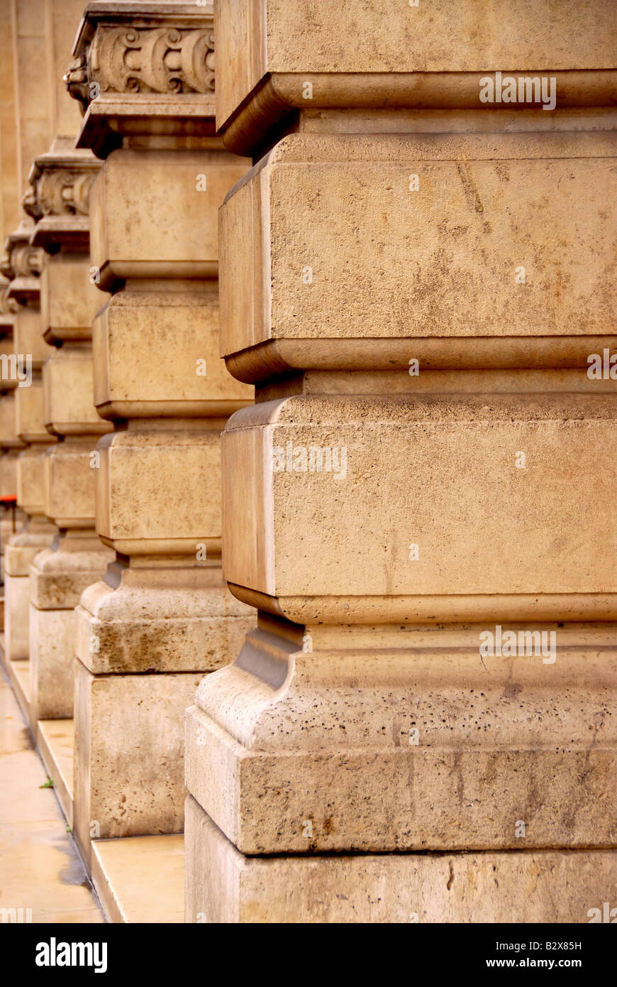 Row of columns in perspective in old historic building Stock Photo - Alamy