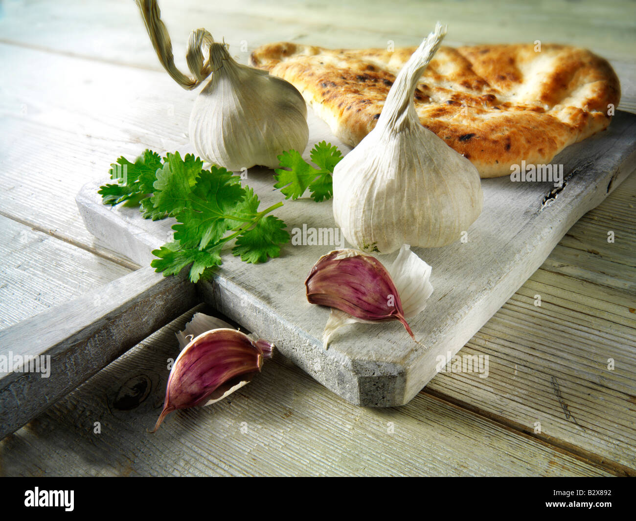 Garlic and coriander Indian Naan Bread Stock Photo - Alamy