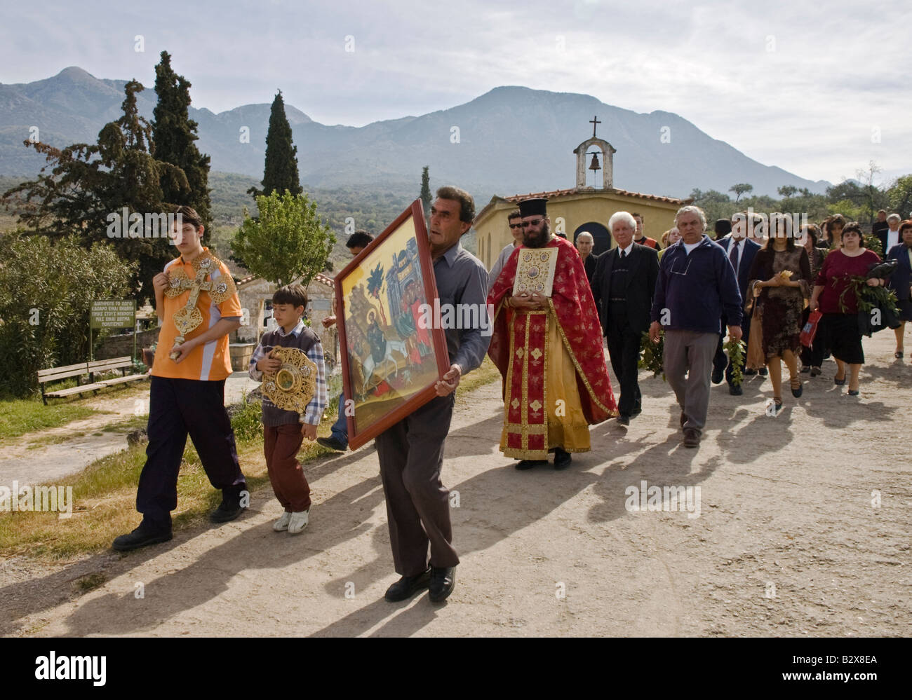 Villagers taking part in an Easter religious procession in the village ...