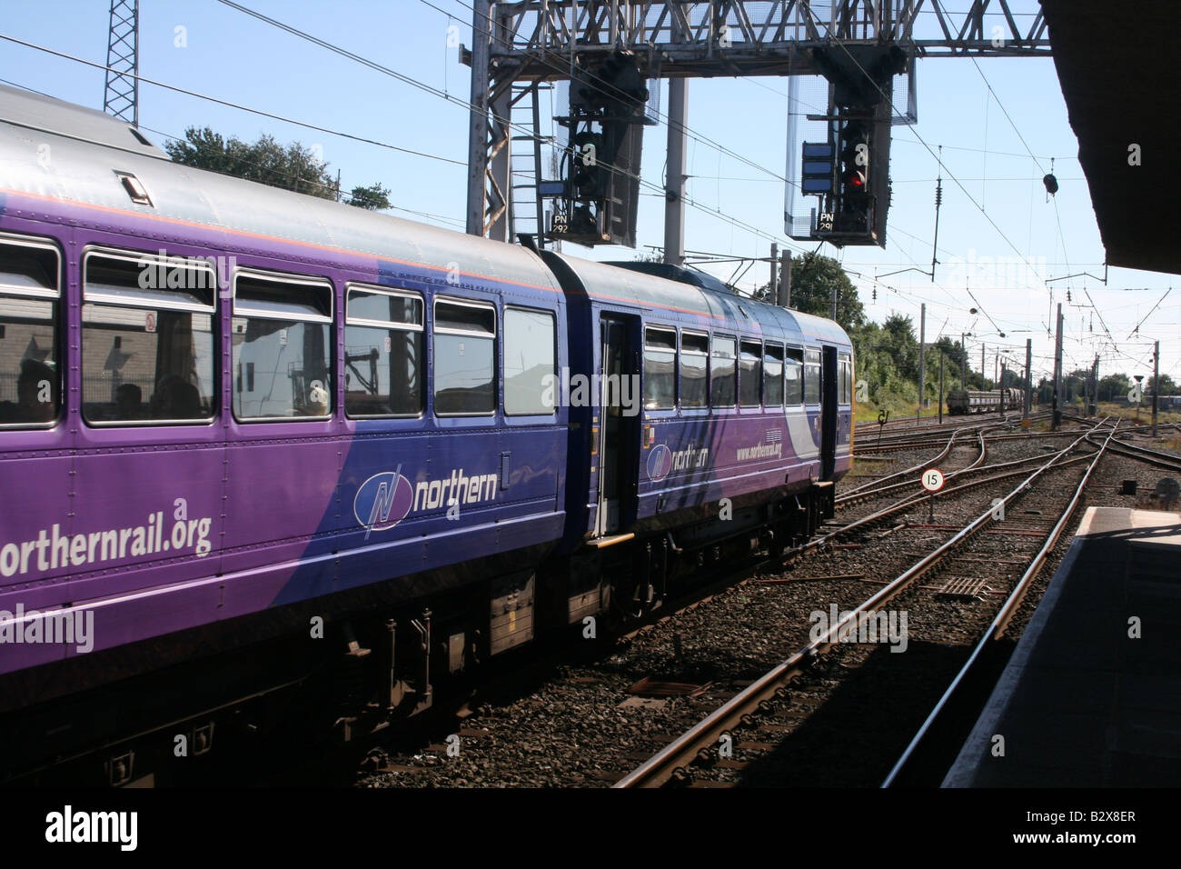 Class 142 diesel multiple unit leaving Carnforth station Stock Photo ...