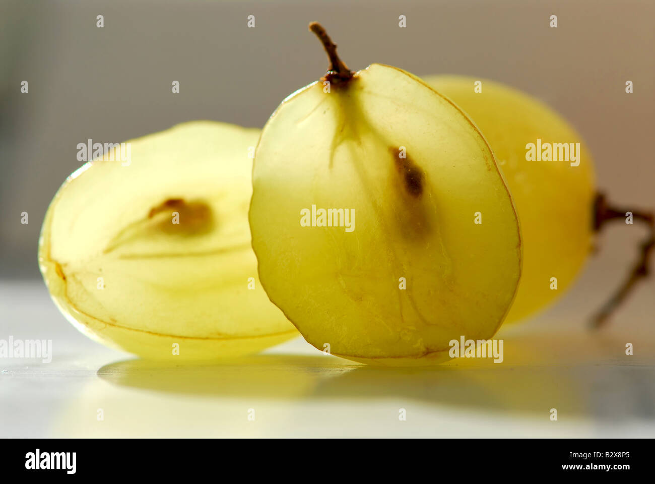 Extreme macro of fresh cut grape berries with seeds Stock Photo - Alamy