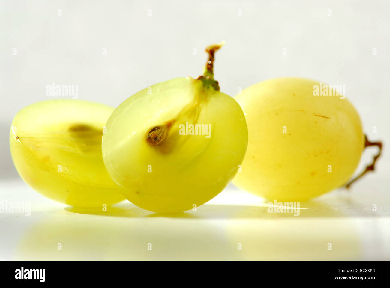 Extreme macro of fresh cut grape berries with seeds Stock Photo - Alamy
