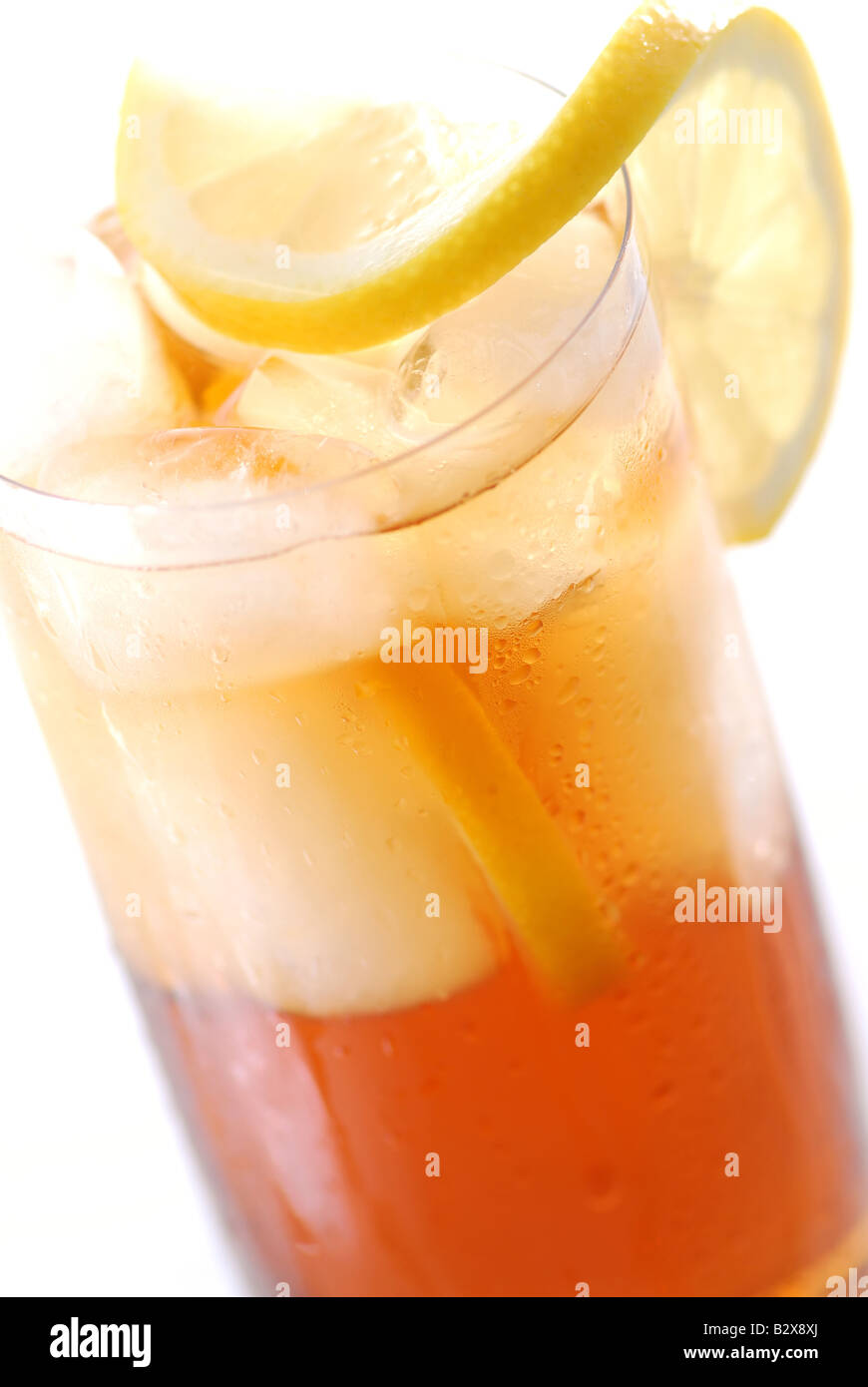 Glass of cold iced tea with water drops on surface Stock Photo - Alamy