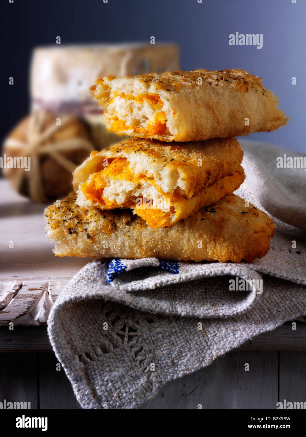 Stromboli bread filled with cheese Stock Photo - Alamy