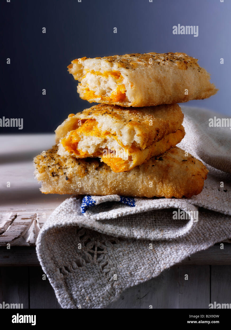 Stromboli bread filled with cheese Stock Photo - Alamy