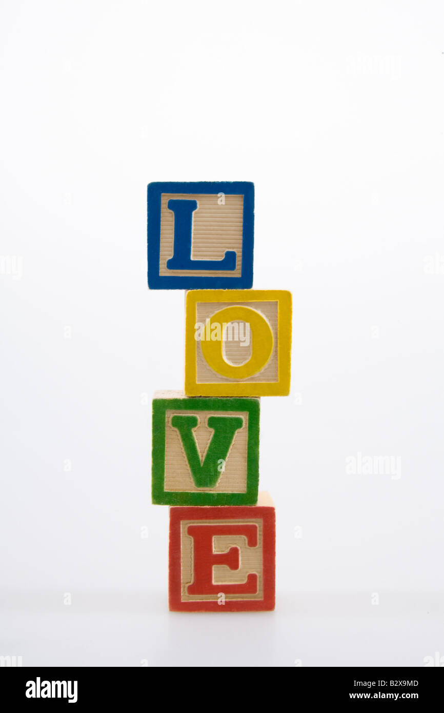 Four wooden blocks spelling love Stock Photo - Alamy