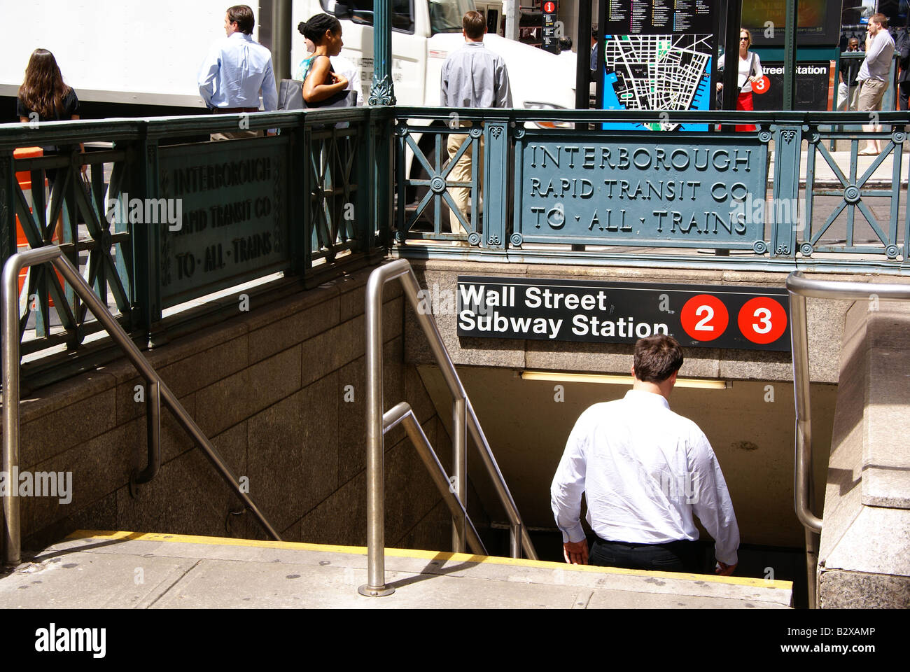 man enters Wall Street subway station, NY Stock Photo - Alamy
