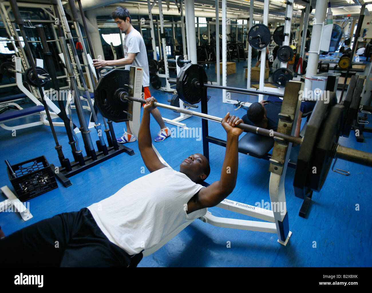 High school students lift weights in the school gym Stock Photo - Alamy