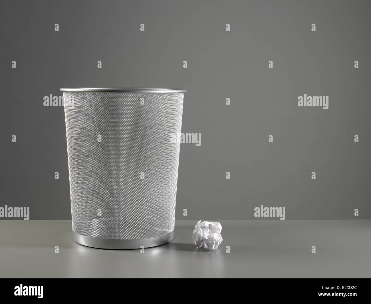 wire mesh paper bin Stock Photo - Alamy