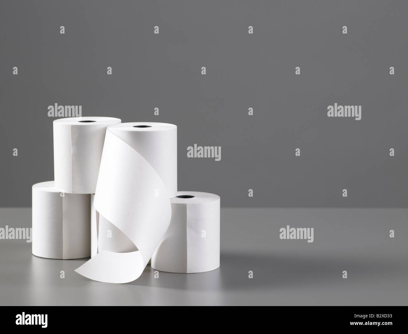 till rolls on grey background Stock Photo - Alamy