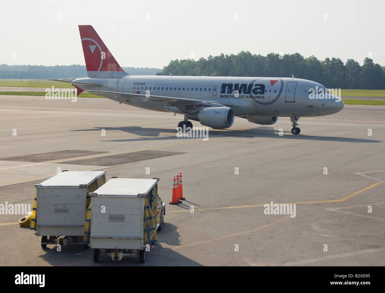 Jet plane on the runway Stock Photo - Alamy