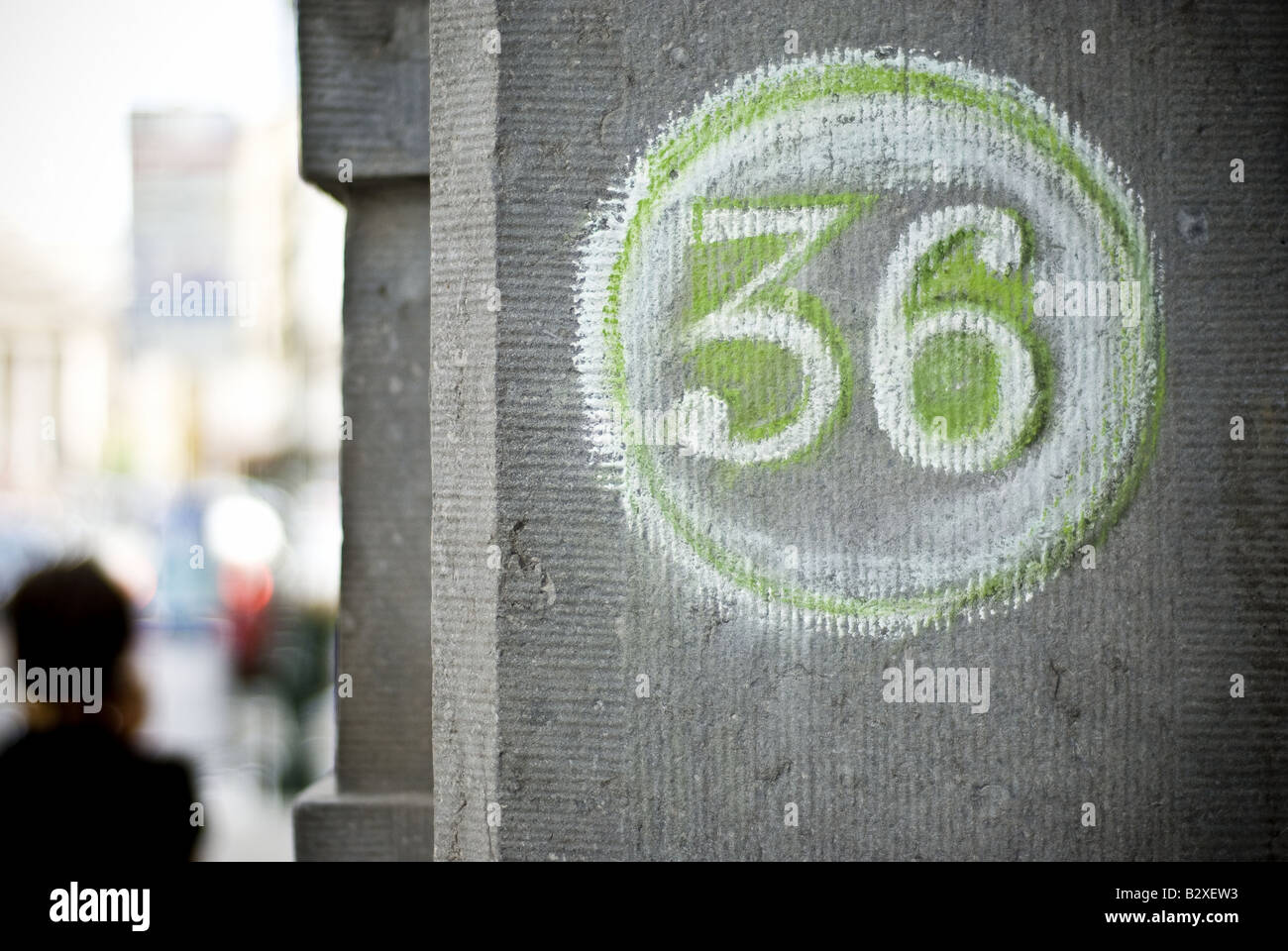 The number 36 written in green and white chalk and surrounded in a ...