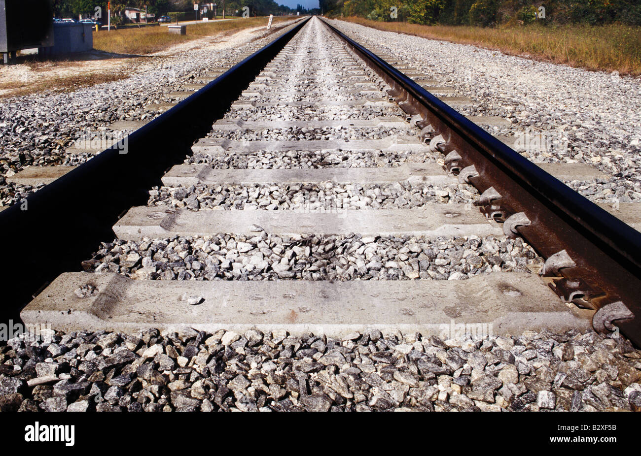 Railroad tracks converging infinity Florida USA Stock Photo - Alamy