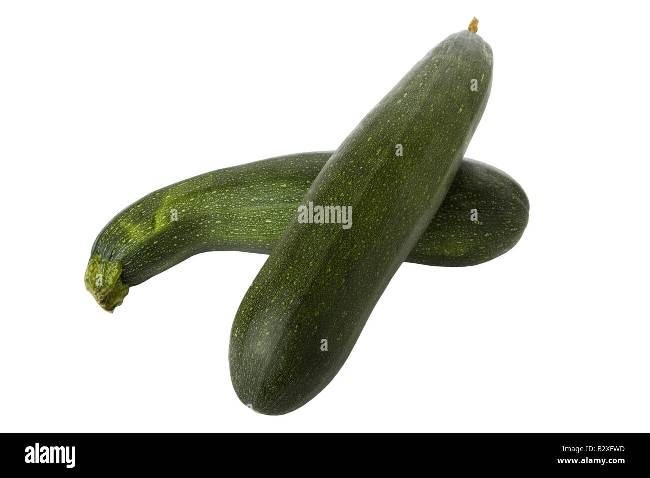 Ripe zucchinis or courgettes isolated on a white background Stock Photo ...