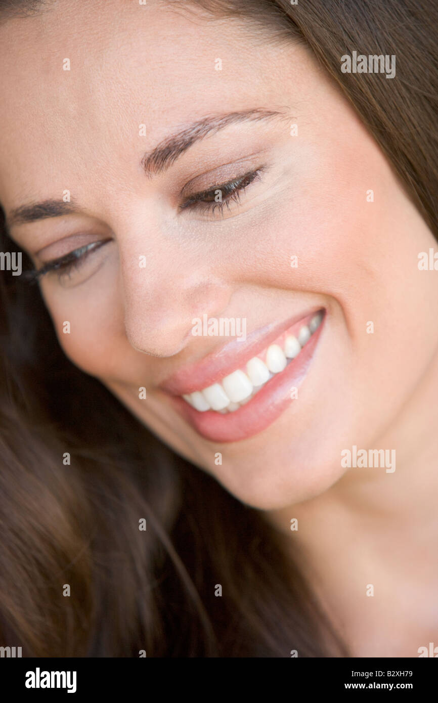 Head shot of woman smiling Stock Photo - Alamy