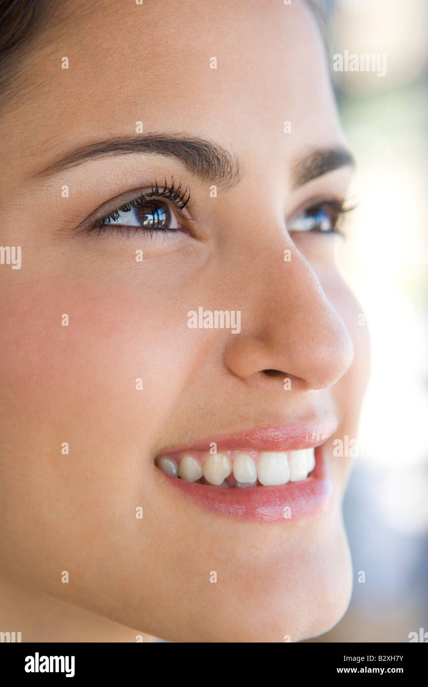 Head shot of woman smiling Stock Photo - Alamy