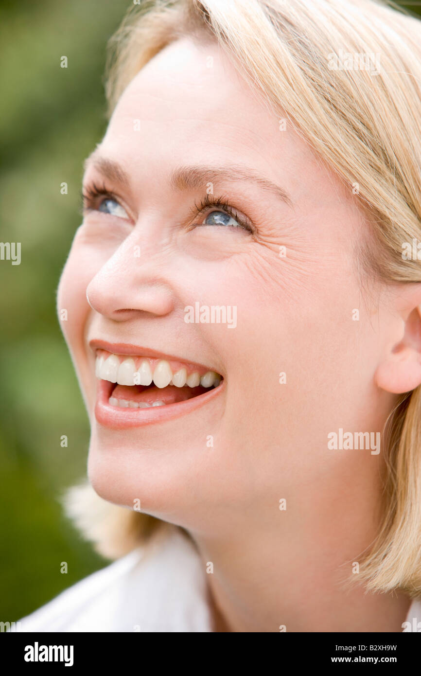 Head shot of woman smiling Stock Photo - Alamy