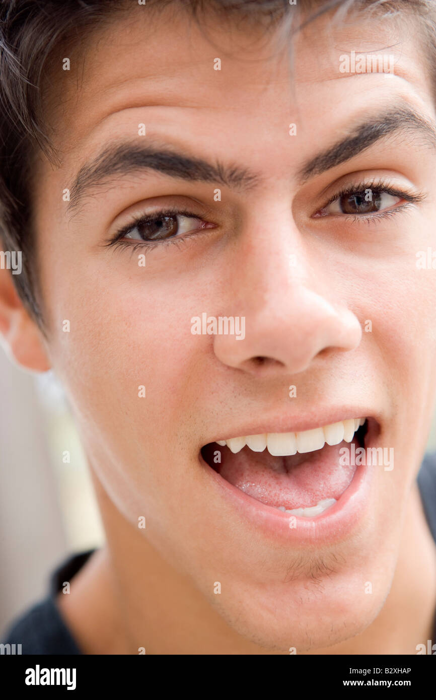 Head shot of man scowling Stock Photo - Alamy