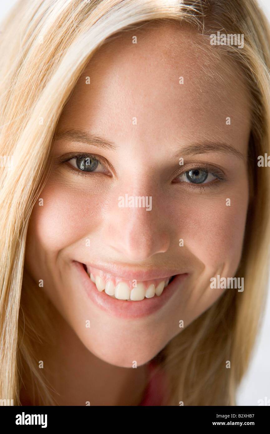 Head shot of woman smiling Stock Photo - Alamy