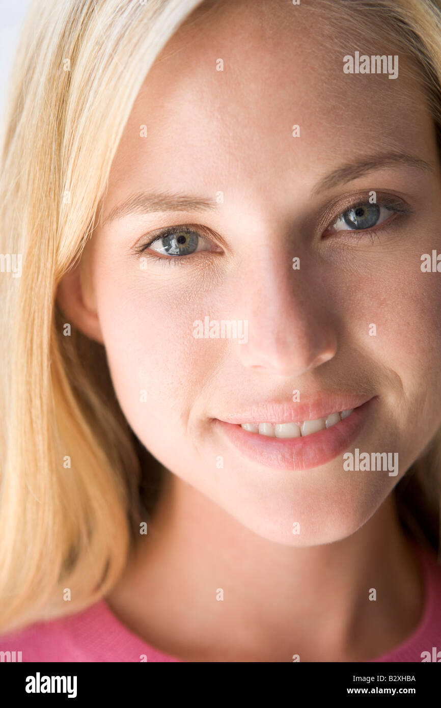 Head shot of woman smiling Stock Photo - Alamy