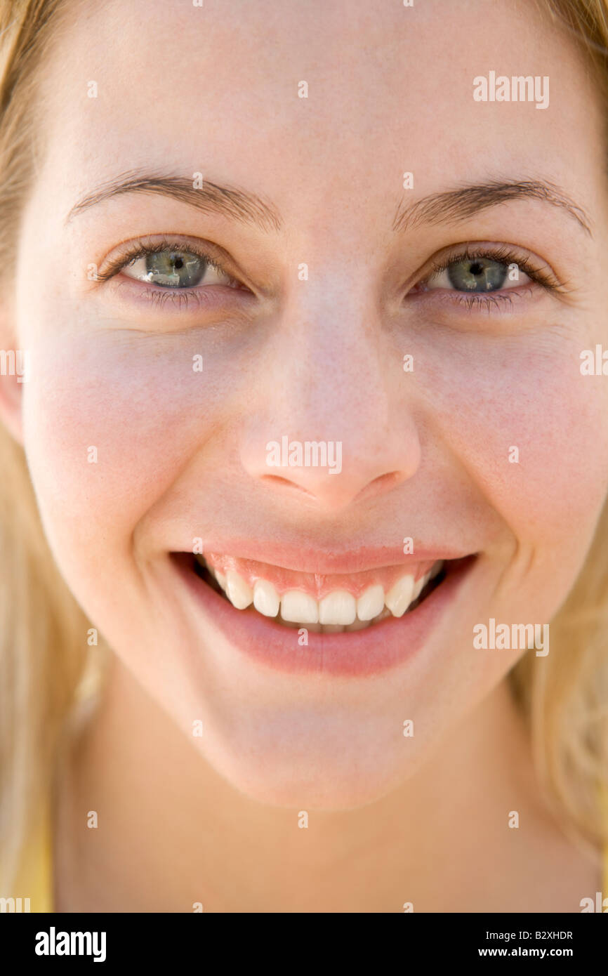 Head shot of woman smiling Stock Photo - Alamy