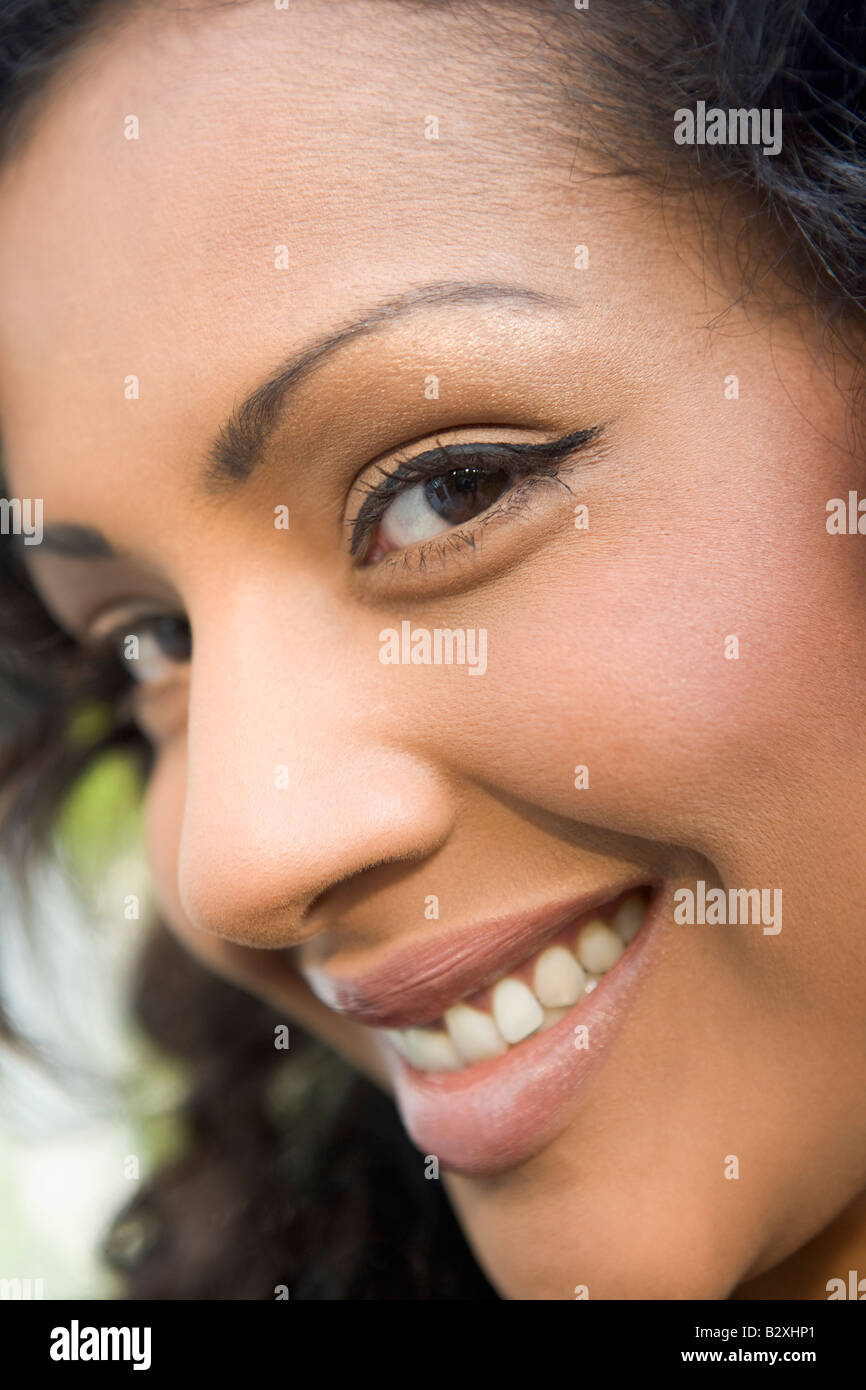 Woman with coy expression hi-res stock photography and images - Alamy