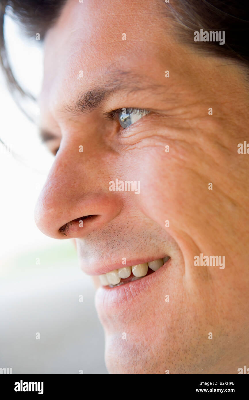 Vertical shot man smiling hi-res stock photography and images - Alamy
