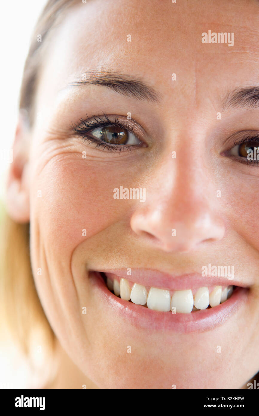 Head shot of woman smiling Stock Photo - Alamy