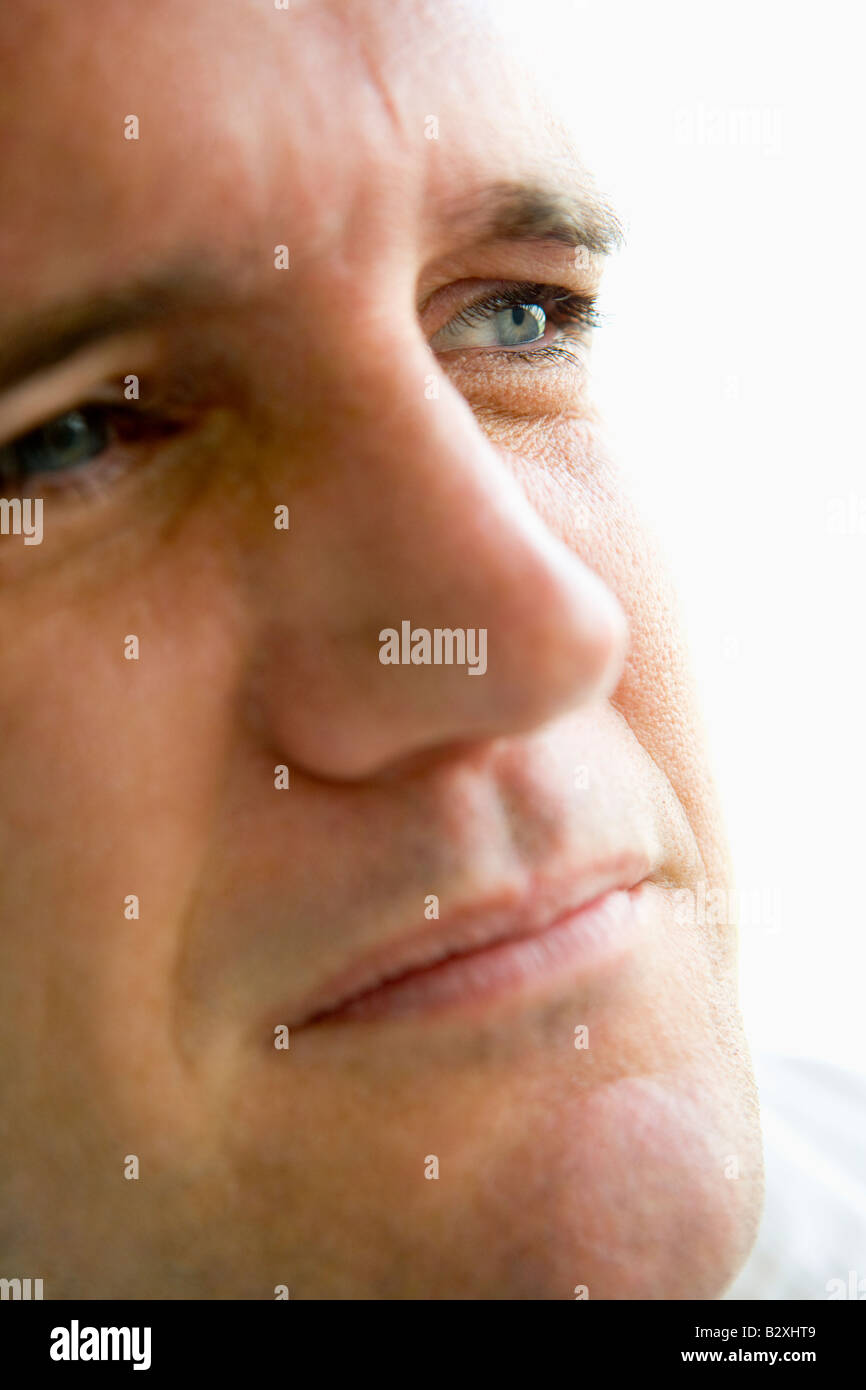 Head shot of man thinking Stock Photo - Alamy