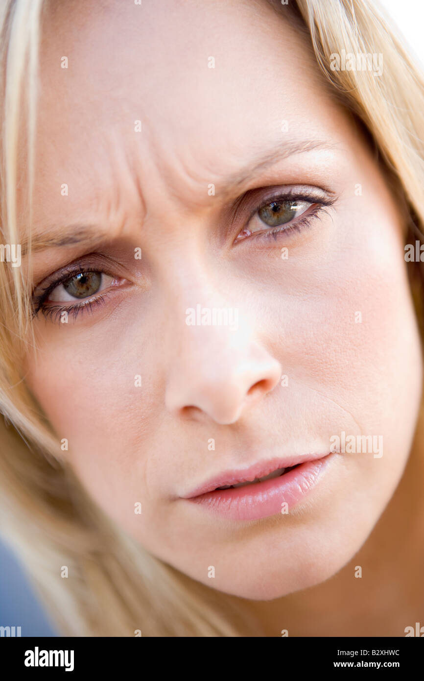 Head shot woman scowling hi-res stock photography and images - Alamy