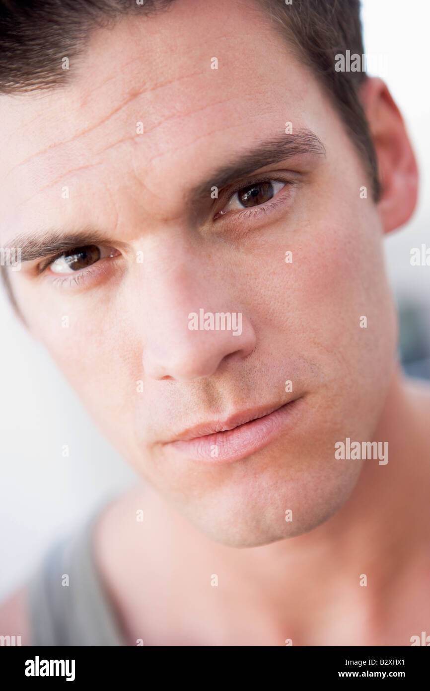 Head shot of man thinking Stock Photo - Alamy
