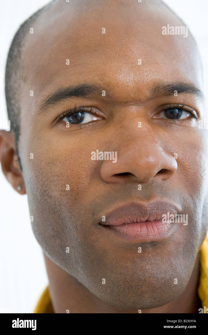 Head shot of man thinking Stock Photo - Alamy