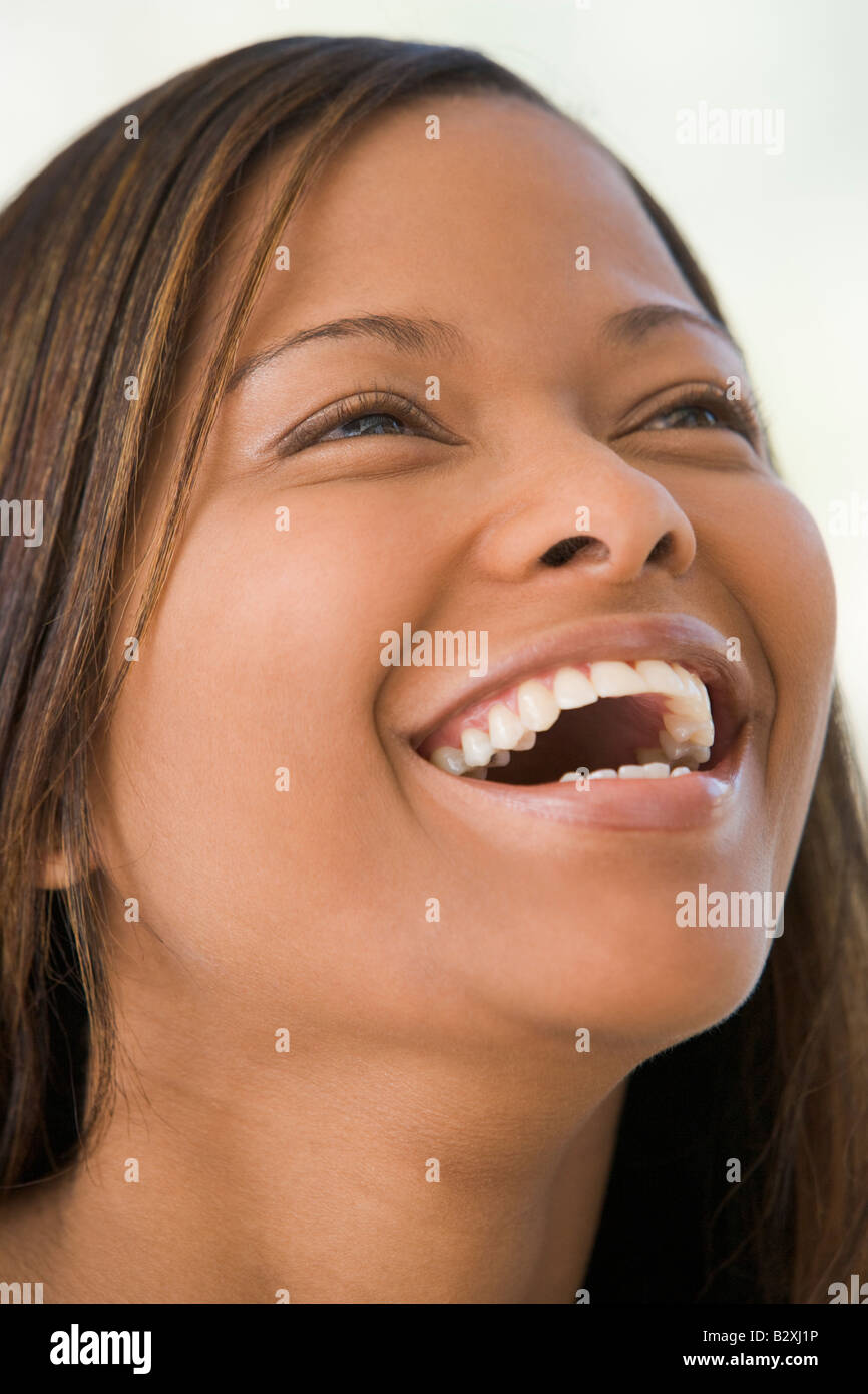Head shot of woman smiling Stock Photo - Alamy