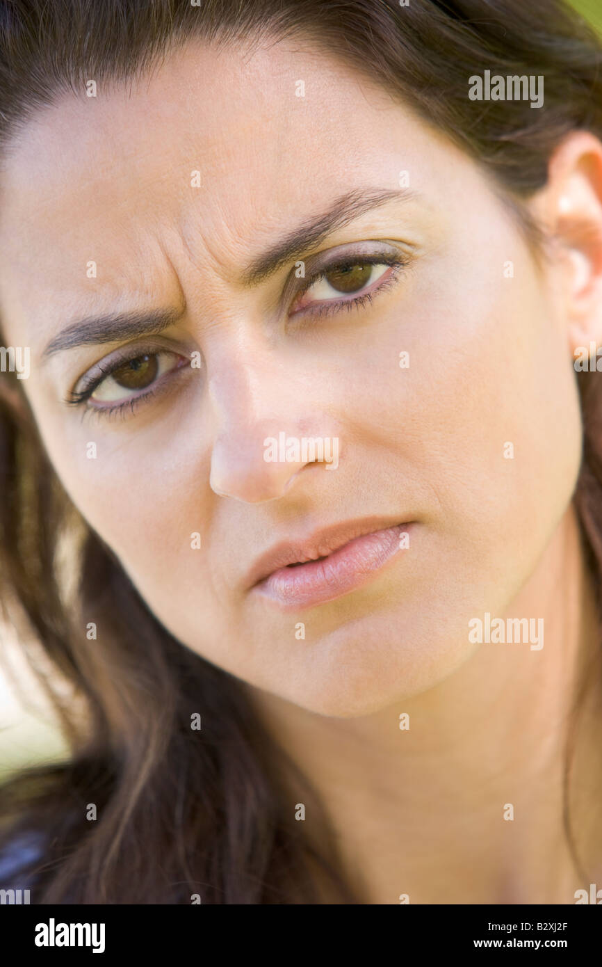 Scowling woman hi-res stock photography and images - Alamy